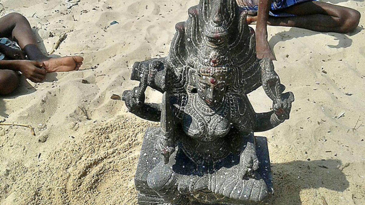 Stone idol found on seashore - The Hindu