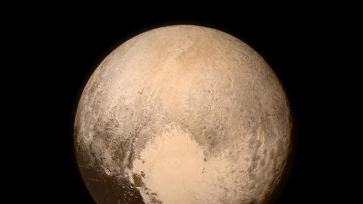 NASA finds giant ‘bite mark’ on Pluto’s surface - The Hindu