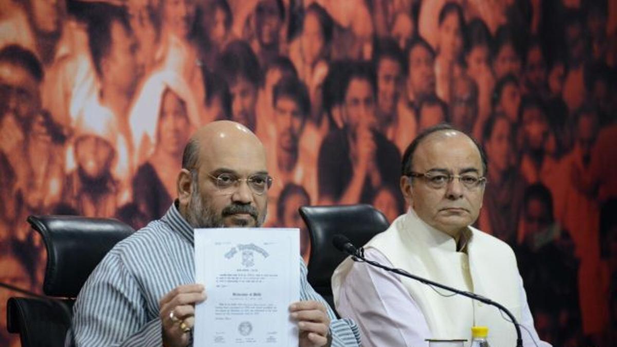 BJP produces Modi degrees, AAP finds discrepancies - The Hindu