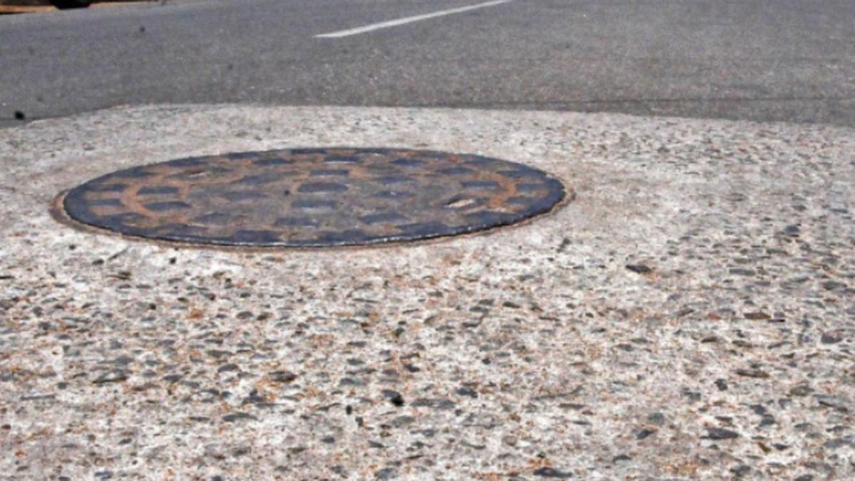 Protruding manhole lids pose threat to motorists - The Hindu