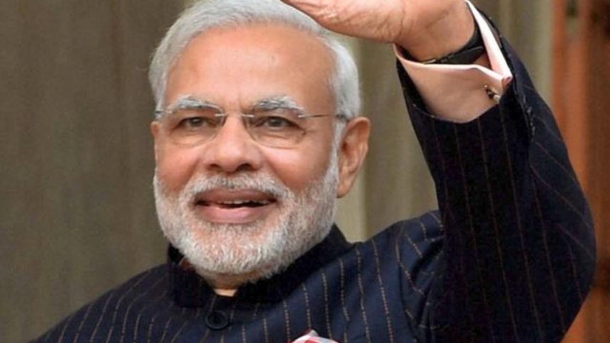 Modi’s monogrammed suit enters Guinness Book - The Hindu
