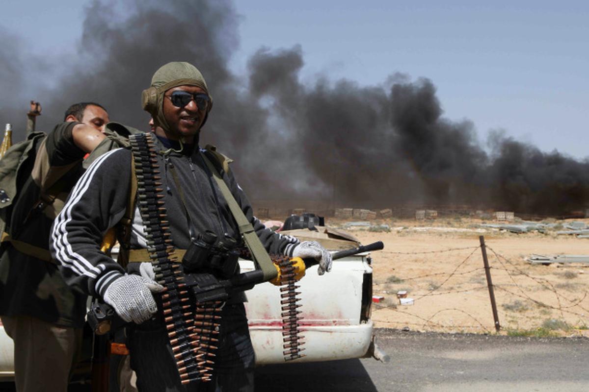 Libyan rebels in battles outside Qadhafi’s hometown - The Hindu