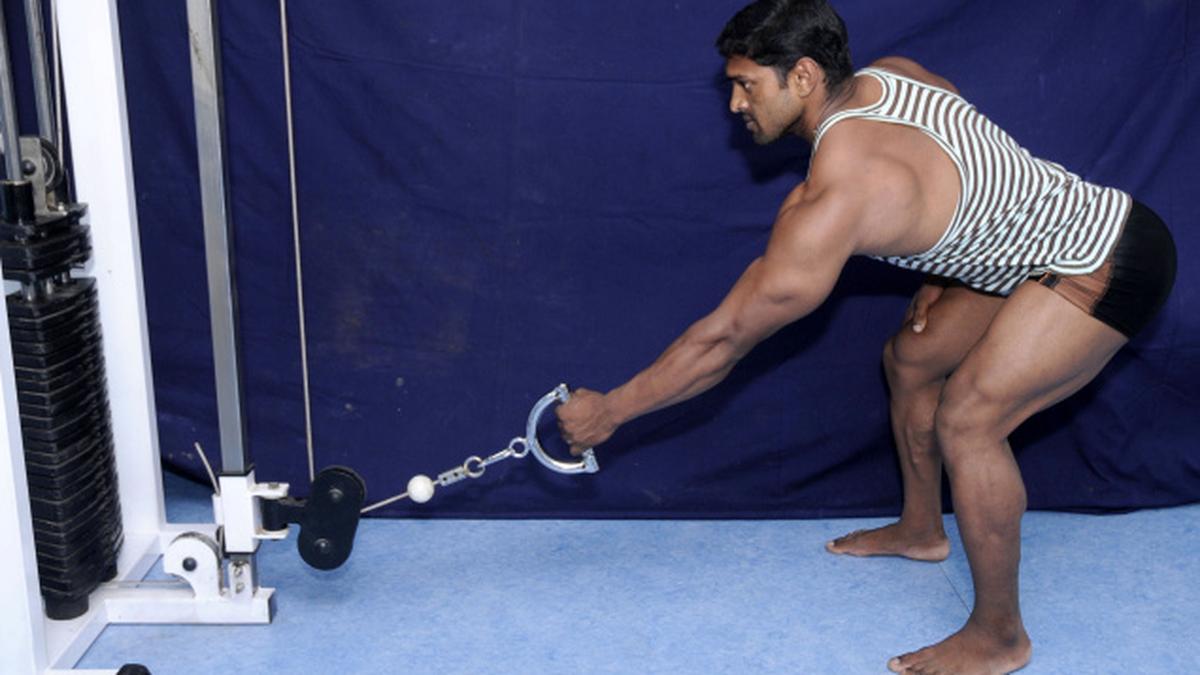 Training Room - One arm low pulley row - The Hindu