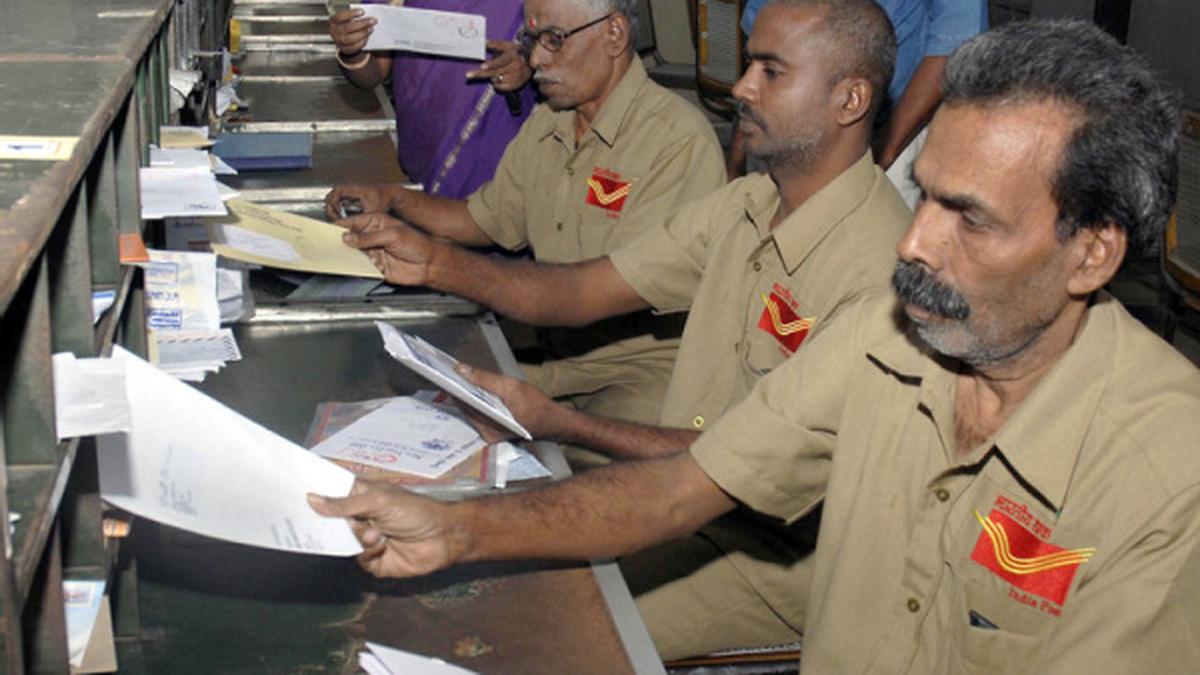 Postmen back to khaki uniform - The Hindu