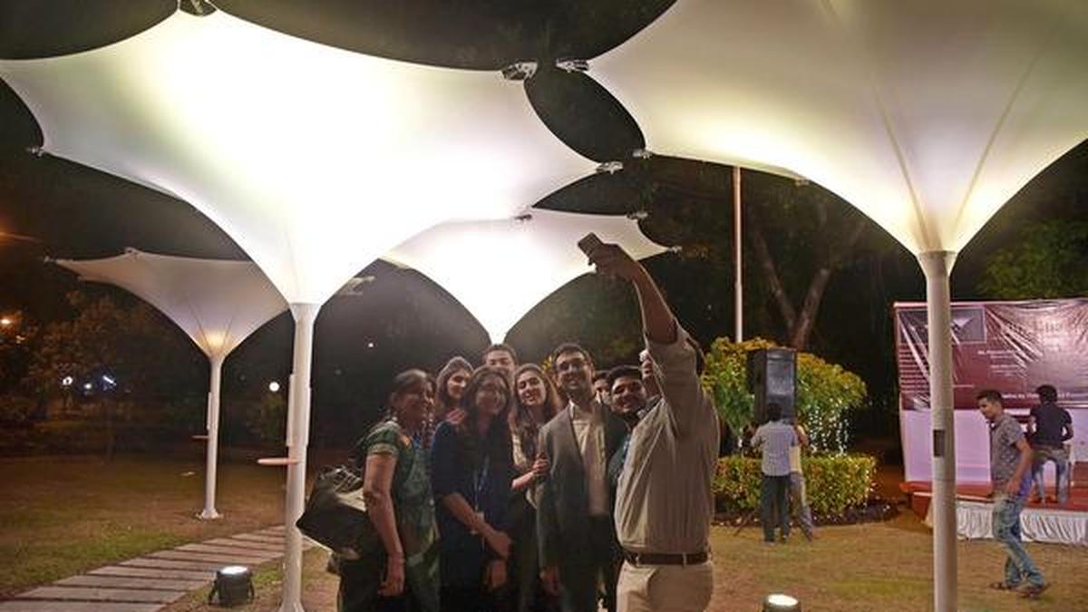 Water idea! Inverted umbrella that purifies rainwater, lights up park ...