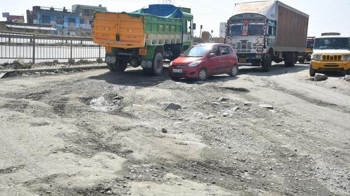 Athimugam Road awaits repair - The Hindu