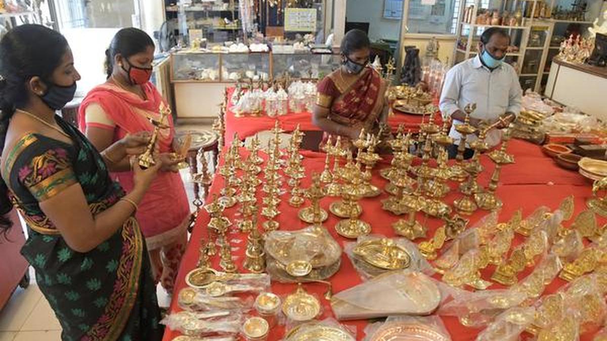 Exhibition of puja items in progress at Poompuhar showroom - The Hindu