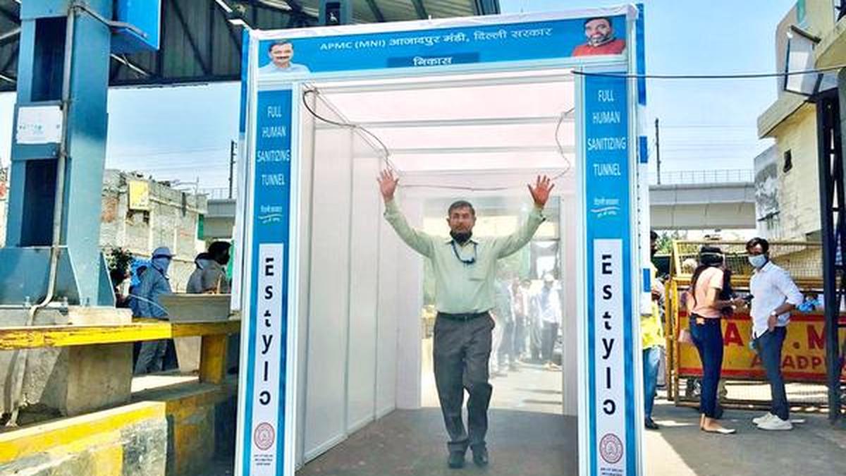 2 sanitisation tunnels installed at gates of Azadpur Mandi - The Hindu