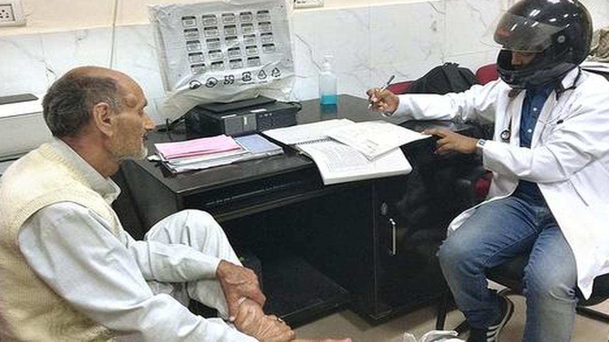 AIIMS doctors come to work wearing helmets - The Hindu