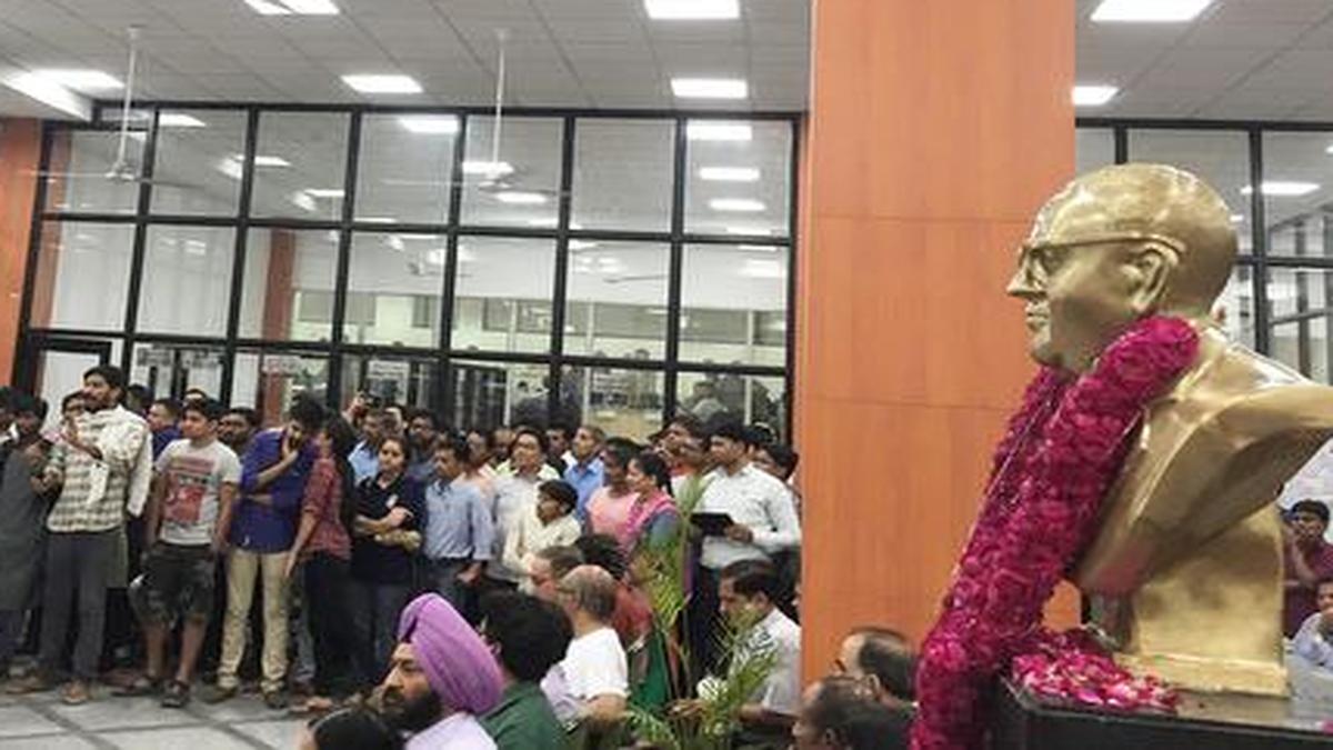 Drama at JNU library renaming event - The Hindu