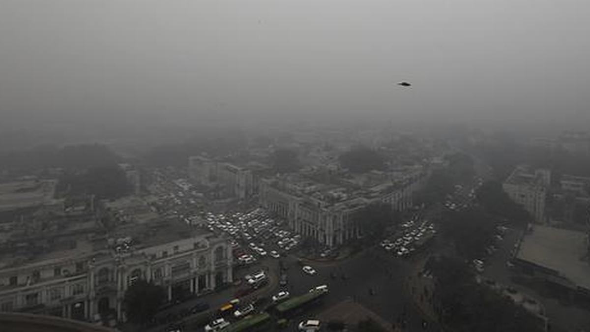 Delhi shivers as cold wave tightens grip on North India - The Hindu