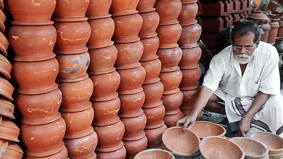 Water-filled clay pots for birds to quench summer thirst - The Hindu