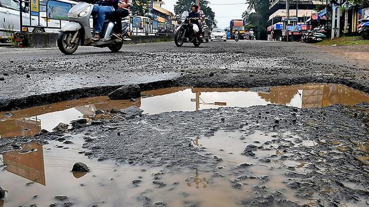 Broken roads bring city to a standstill - The Hindu