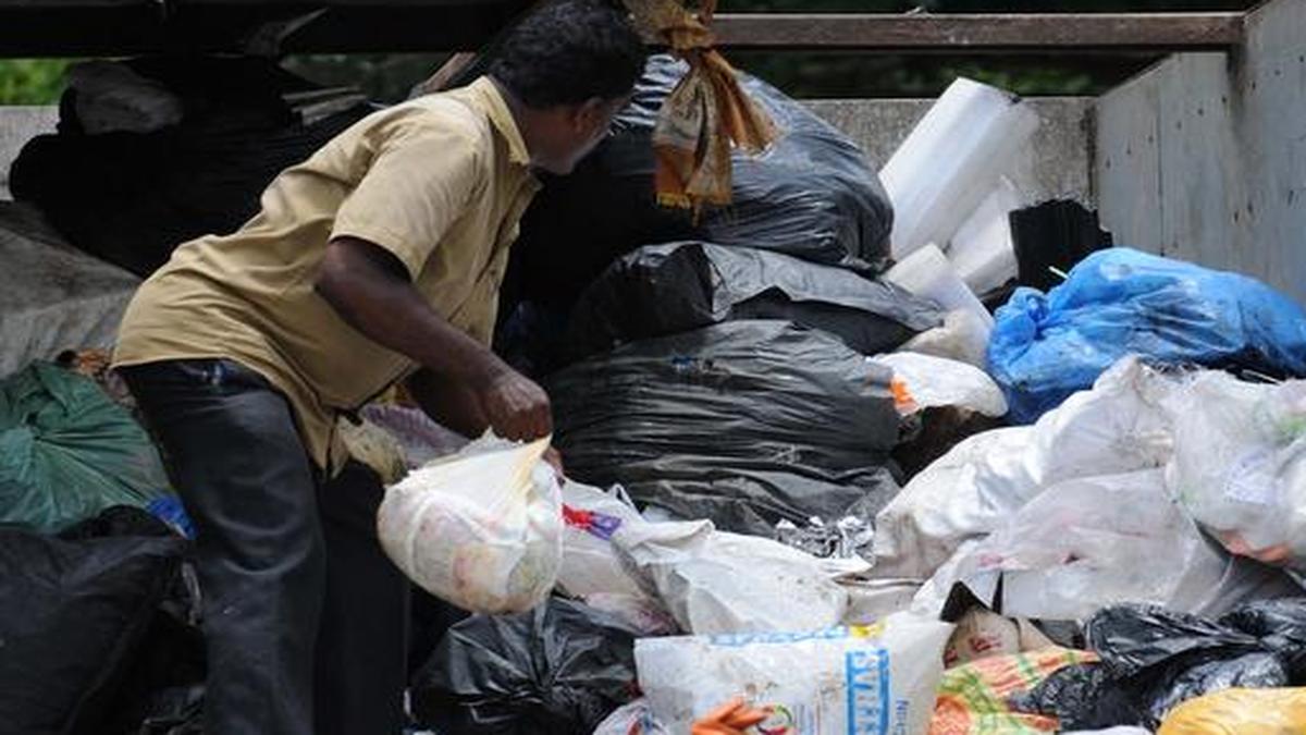 Stinking heaps of refuse pile up on city streets - The Hindu