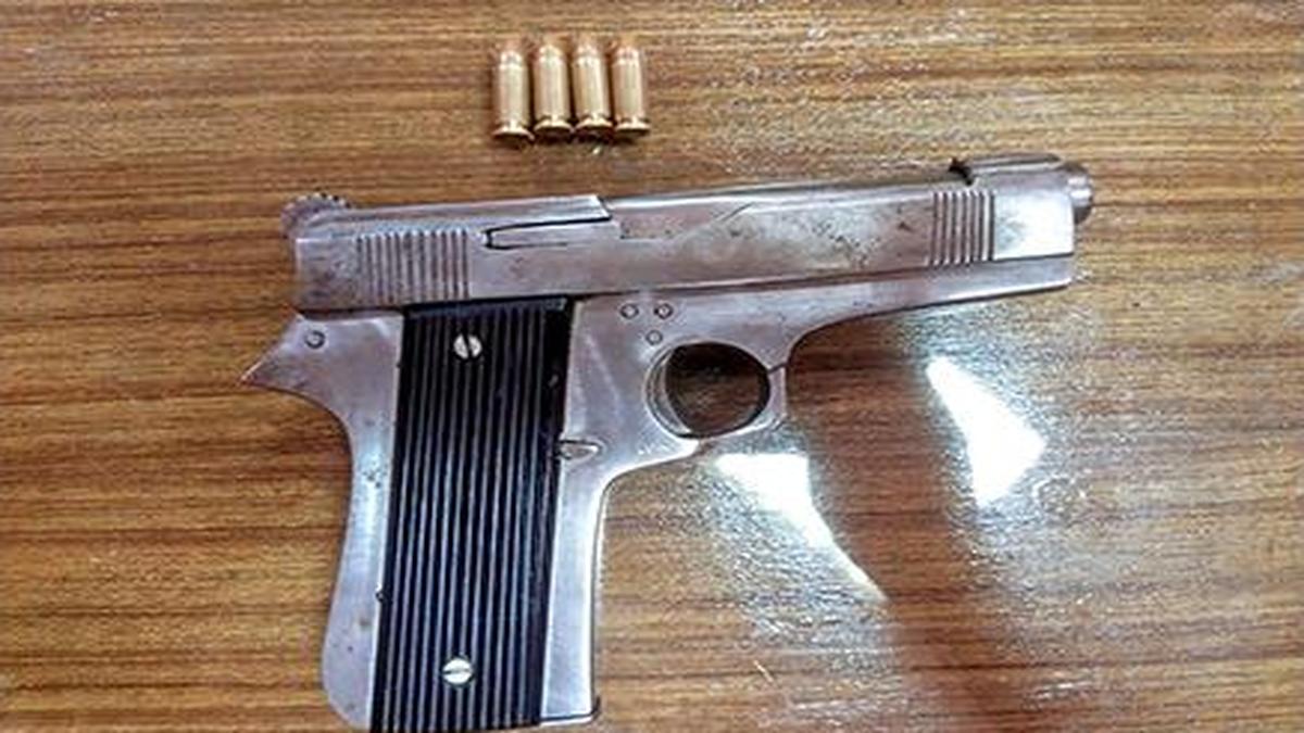 Pistol with four rounds seized in Madurai - The Hindu