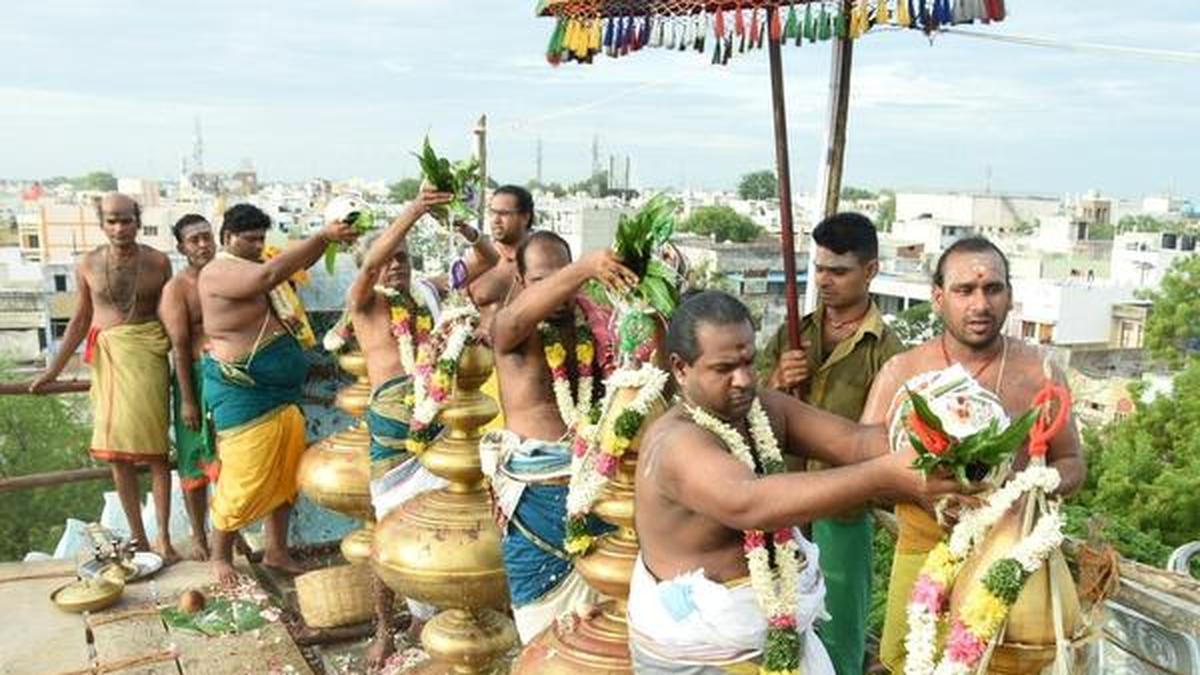 Special kumbhabishekam atop temple tower - The Hindu