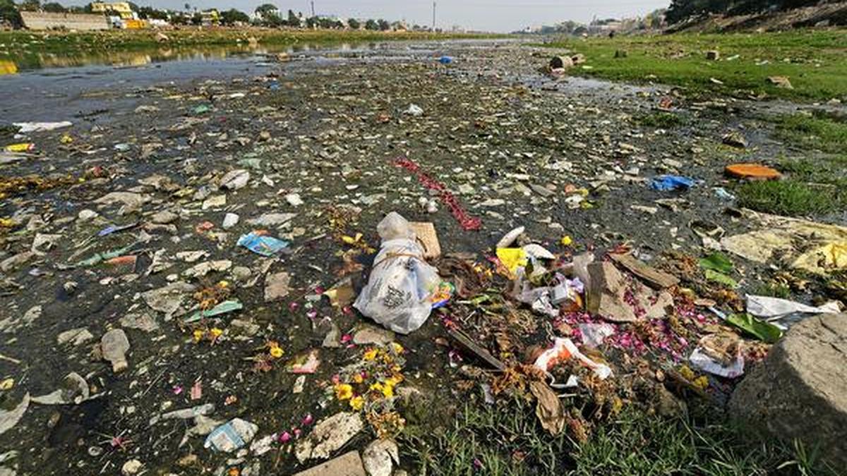Quiet flows sewage into Vaigai - The Hindu