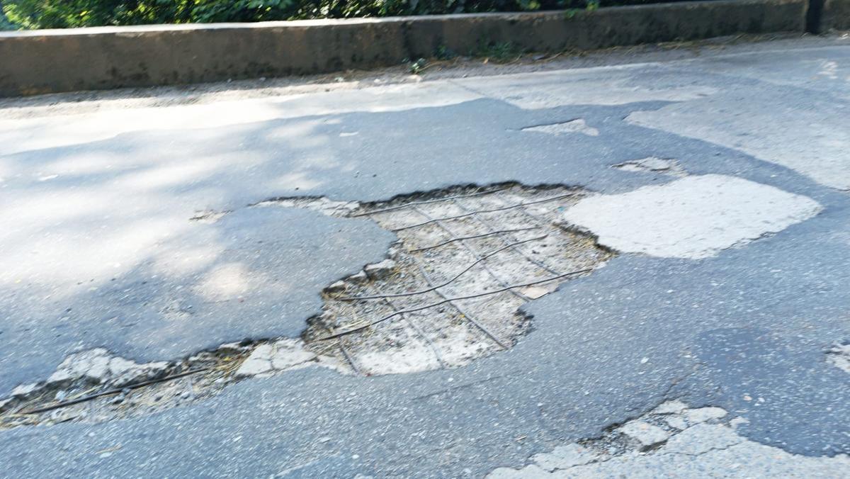 Watch | Despite scanty rain, newly laid bitumen on NH 75 washed away ...