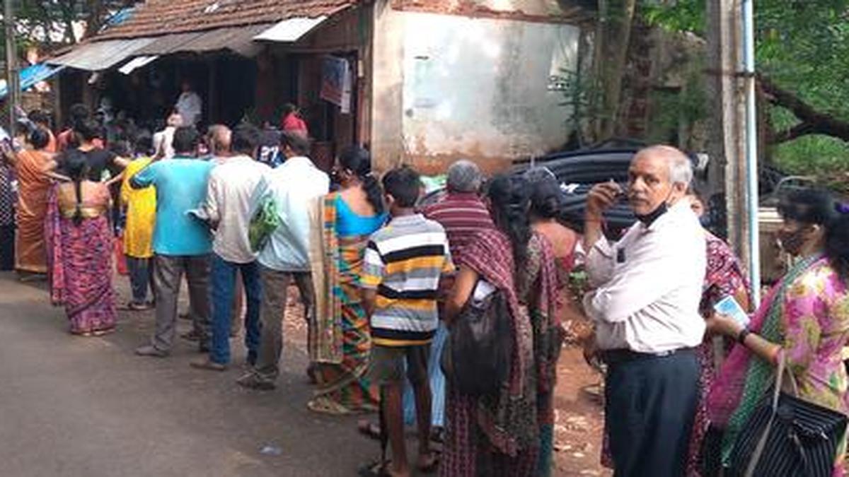 Long queues in front of ration shops - The Hindu