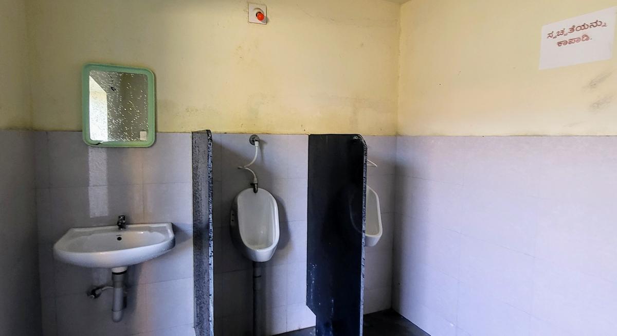 Well-maintained bus shelter with mini library, clean public toilets ...