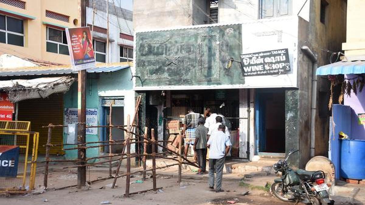 Now, barricades outside TASMAC shop - The Hindu