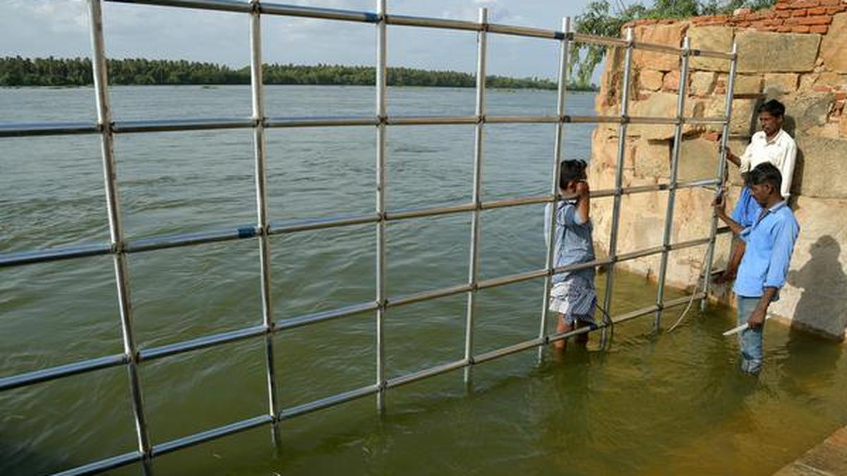 Barricades at bathing ghats - The Hindu