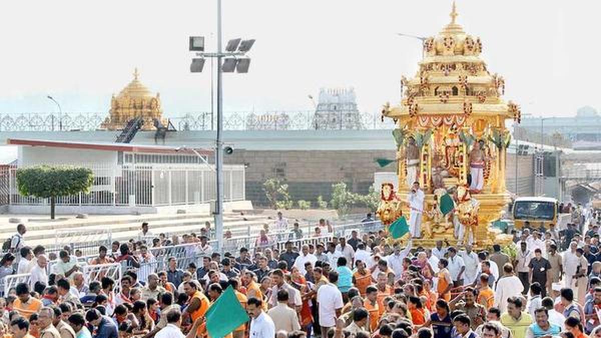 Grandeur marks golden chariot procession - The Hindu