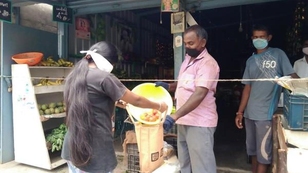 Kumaran Kudil residents promote safe shopping - The Hindu