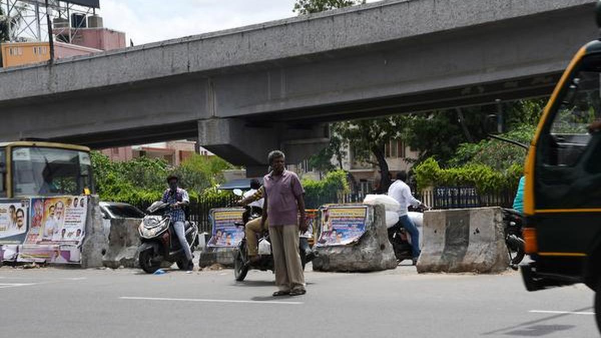 Motorists up against boulders near Tambaram flyover service lane - The ...