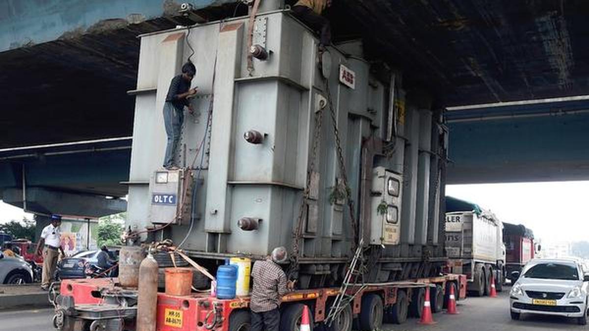 Vehicle carrying old transformer gets stuck under Chennai bridge - The ...