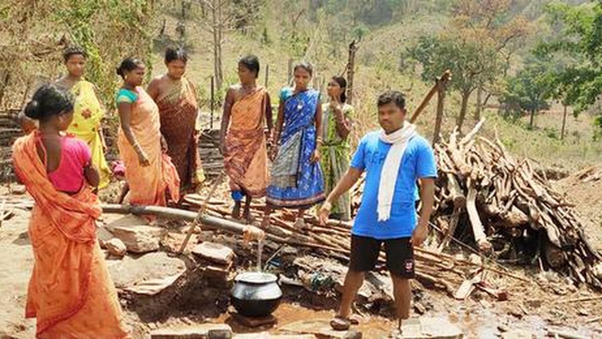 Tribal people bring water to their two villages - The Hindu