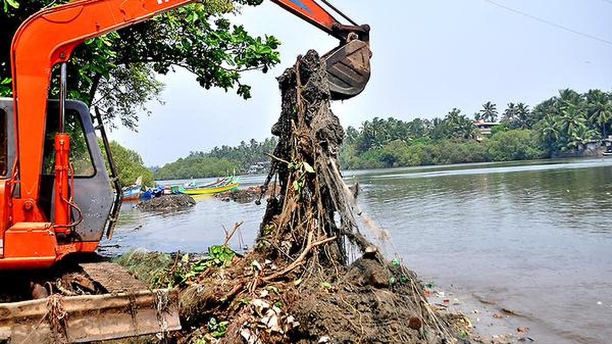Long wait ends; dredging to save Kallayi river begins - The Hindu
