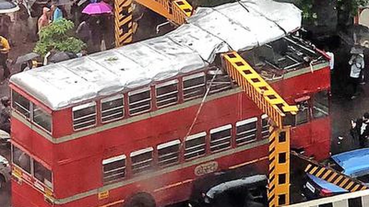 Bus crashes into height barricade - The Hindu