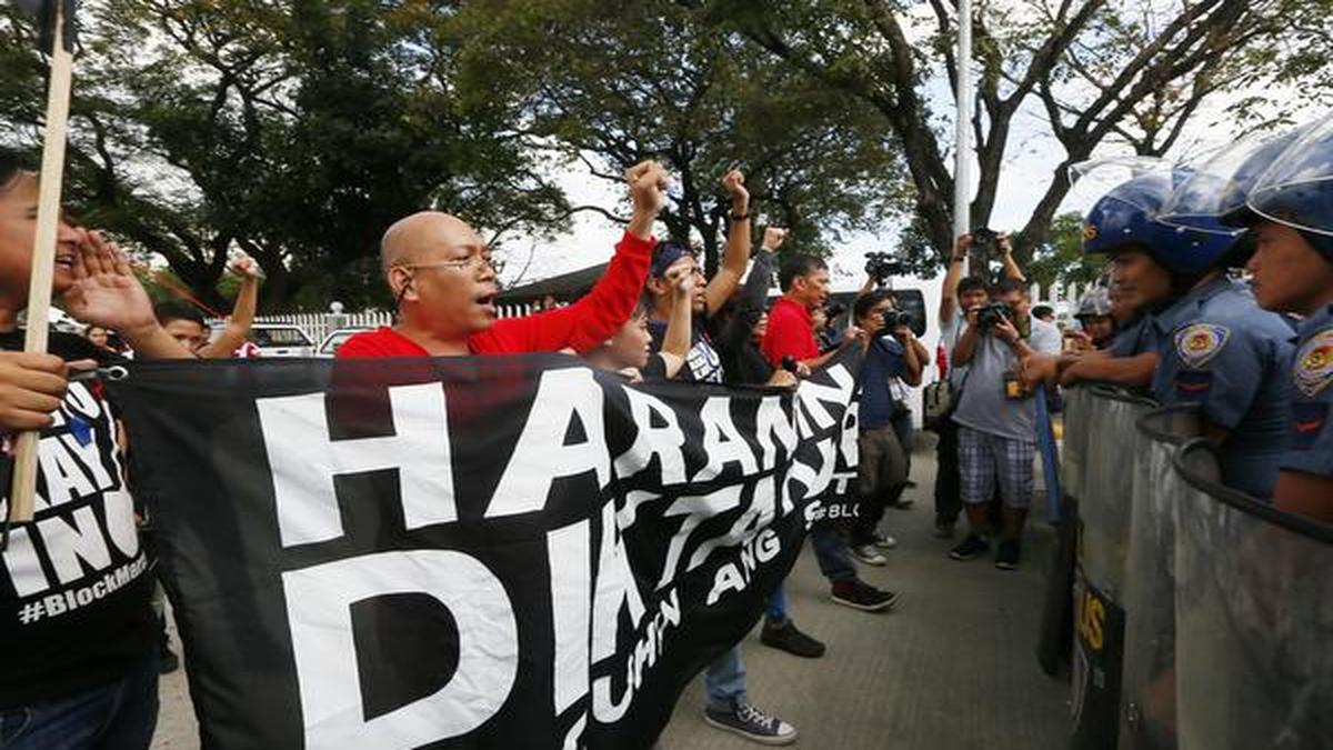Protesters mark Philippine revolt by condemning killings - The Hindu