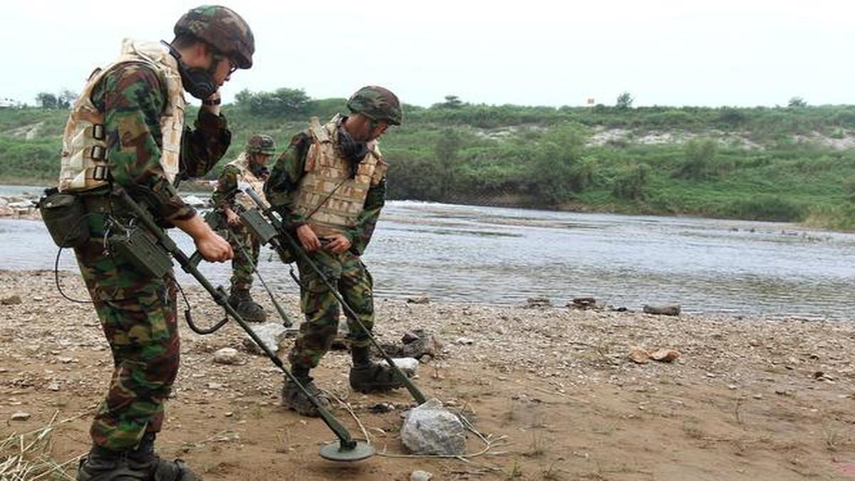North Korea, South Korea begin removing landmines along fortified ...