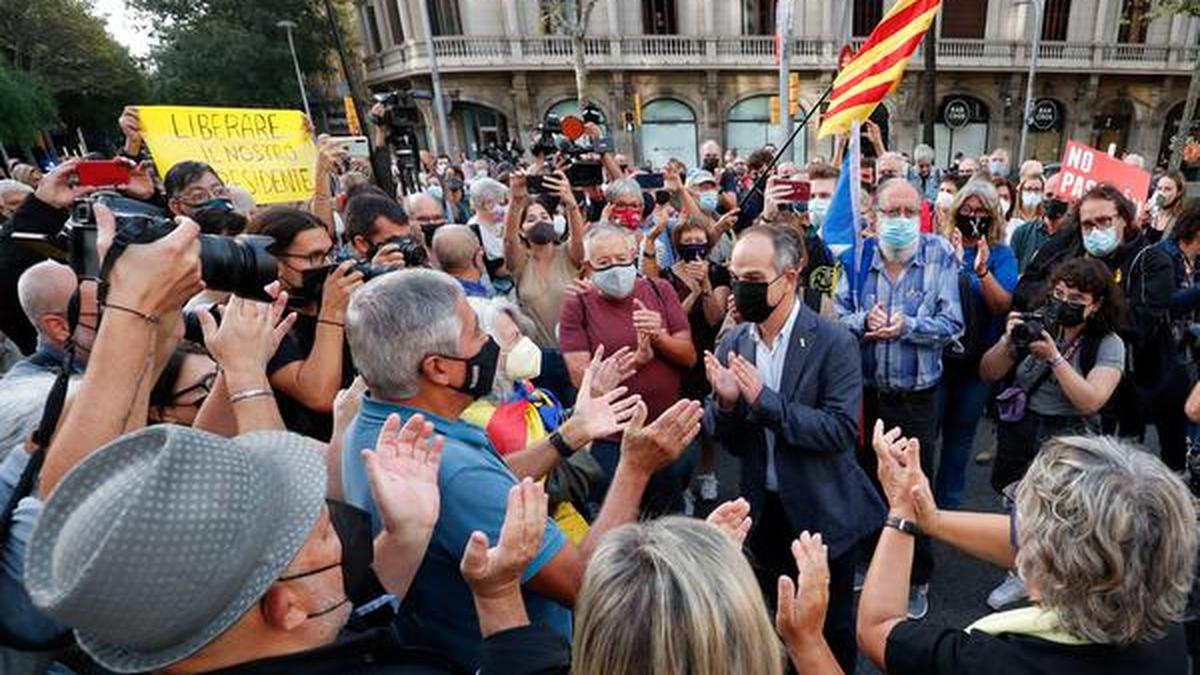 Spain says Catalan separatist leader detained in Italy must face ...