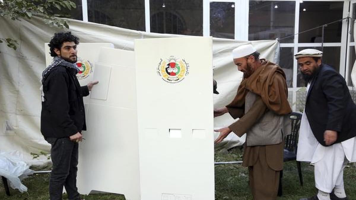 Afghans vote amid chaos, corruption and Taliban threats - The Hindu