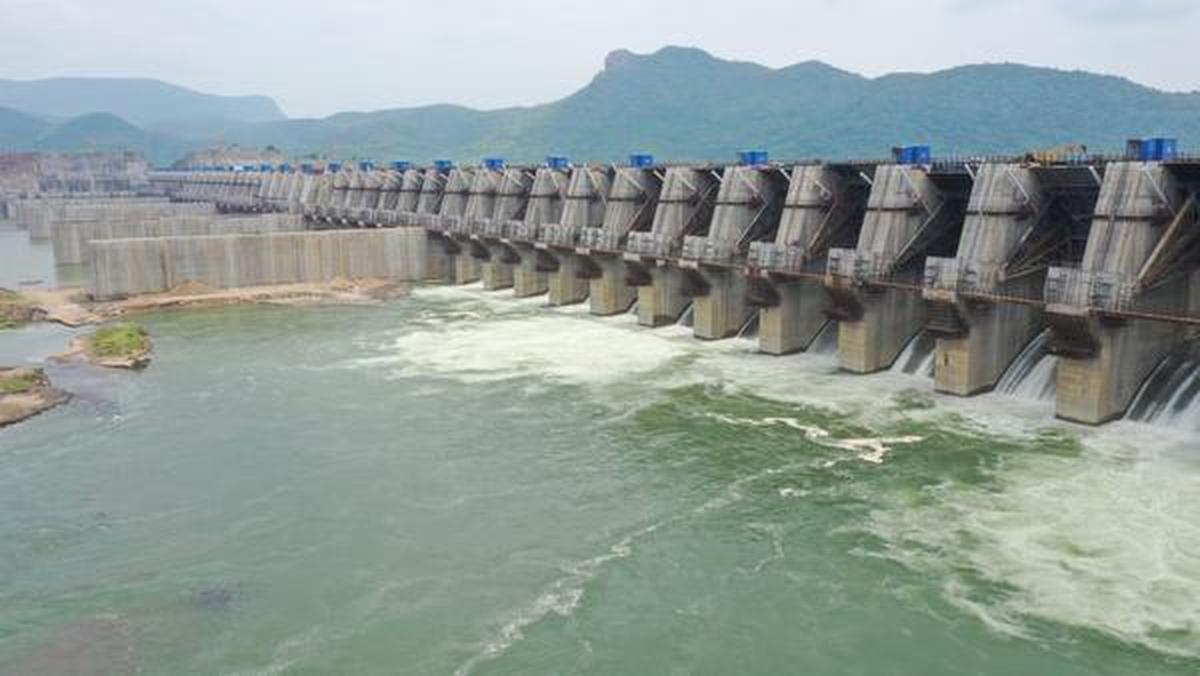 Villagers throng Polavaram dam to see floodwaters - The Hindu