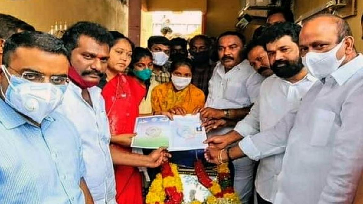 Home Minister hands over house site patta to Ramya’s family - The Hindu