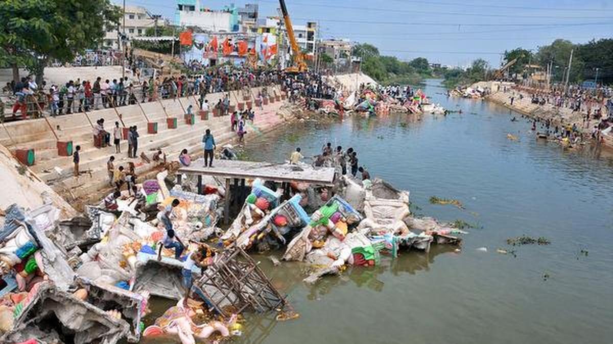 Ganesh idols pile up in KC Canal - The Hindu