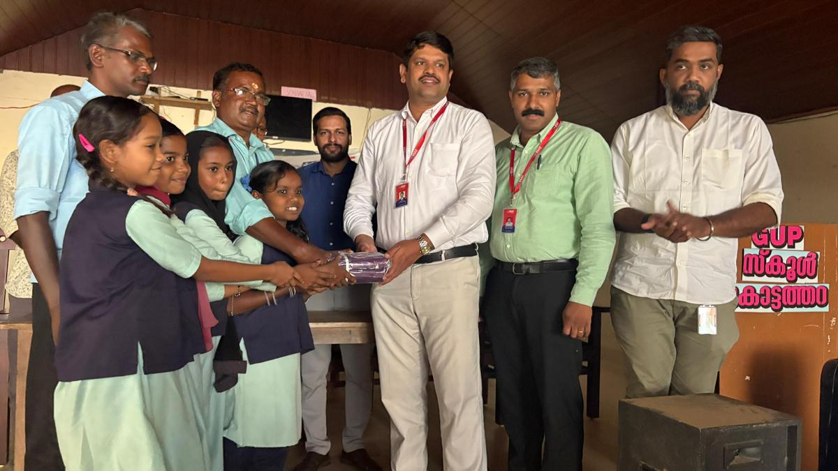 Thampu provides free umbrellas to Attappady tribal students - The Hindu