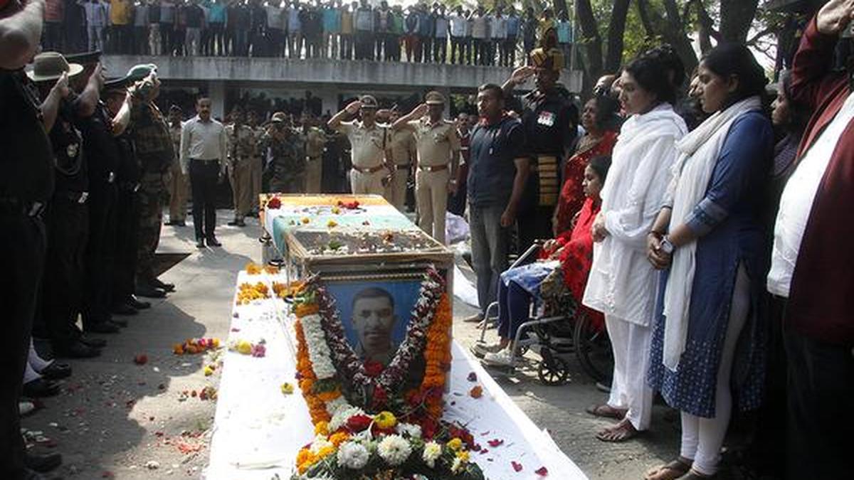 Family and friends bid tearful adieu to Major Nair - The Hindu