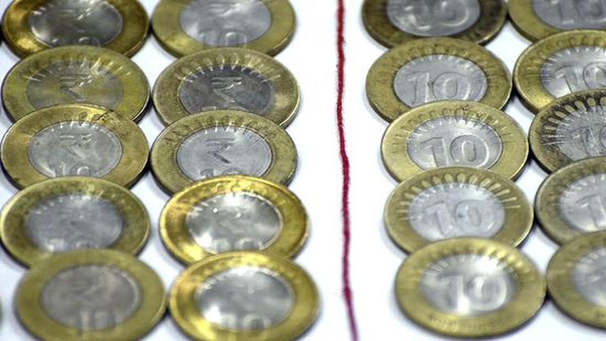 Rs.10 coins pile up as rumours take toll - The Hindu