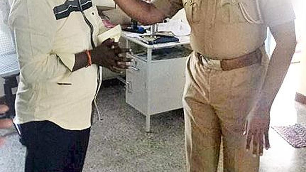 Birthday cake to rowdy lands inspector in soup - The Hindu