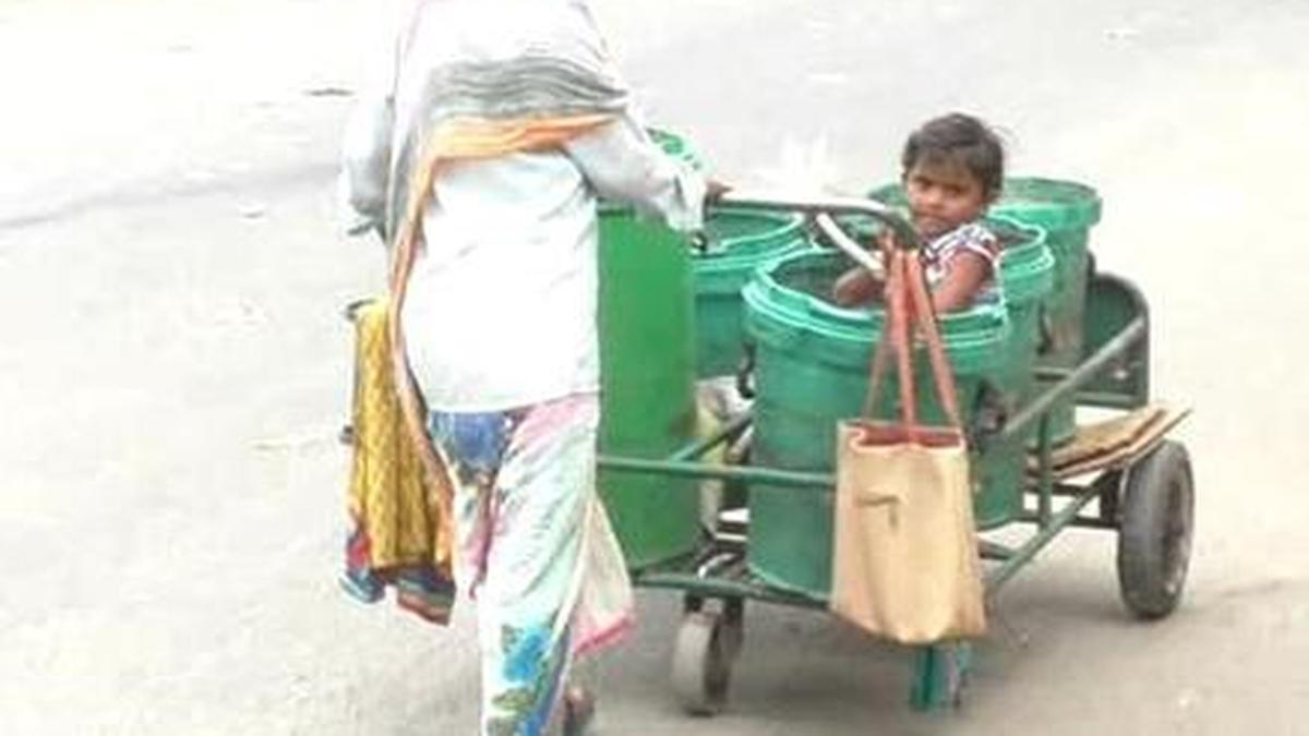 Images of child in dustbin go viral: Collector promises action - The Hindu