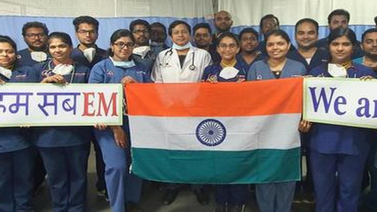 Indian emergency healthcare workers sing along with their counterparts ...
