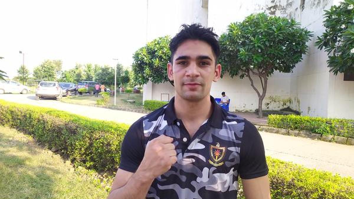 Boxing | Tokas beats Vanhlimpuia in 75kg pre-quaterfinal bout - The Hindu