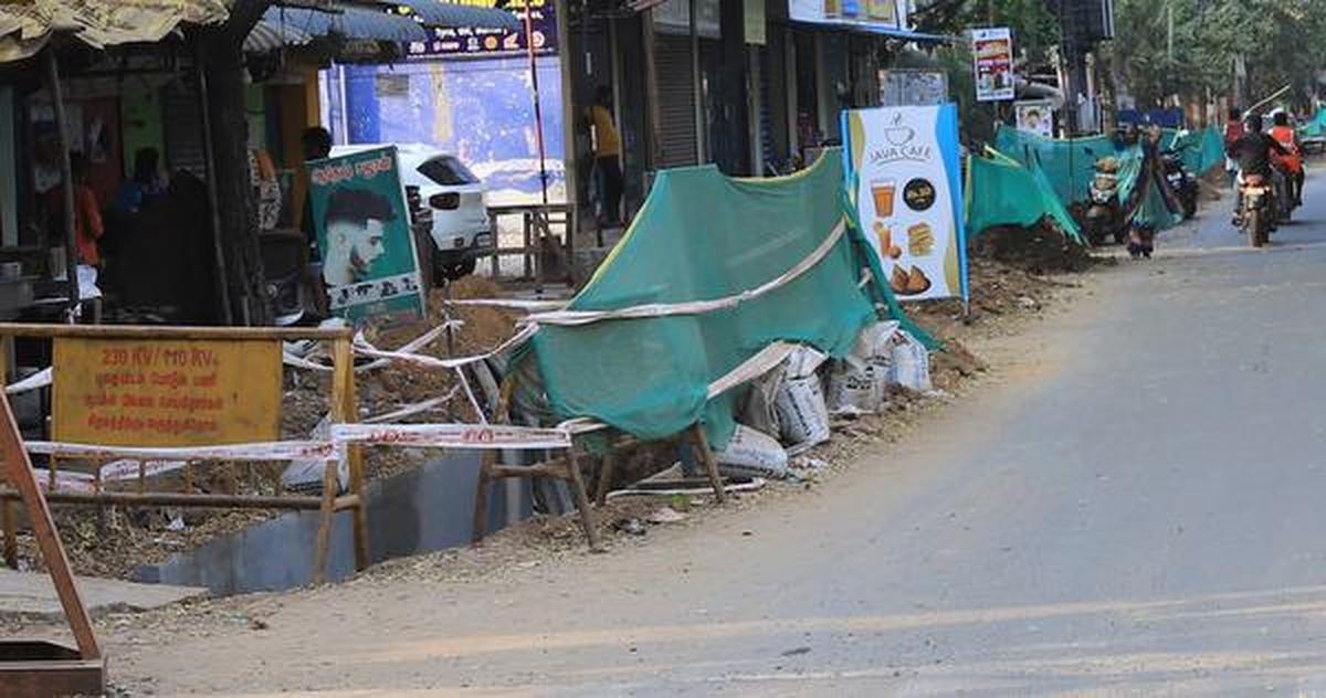 On Puliyur Main Road, debris is placed by the side of Trustpuram Canal ...