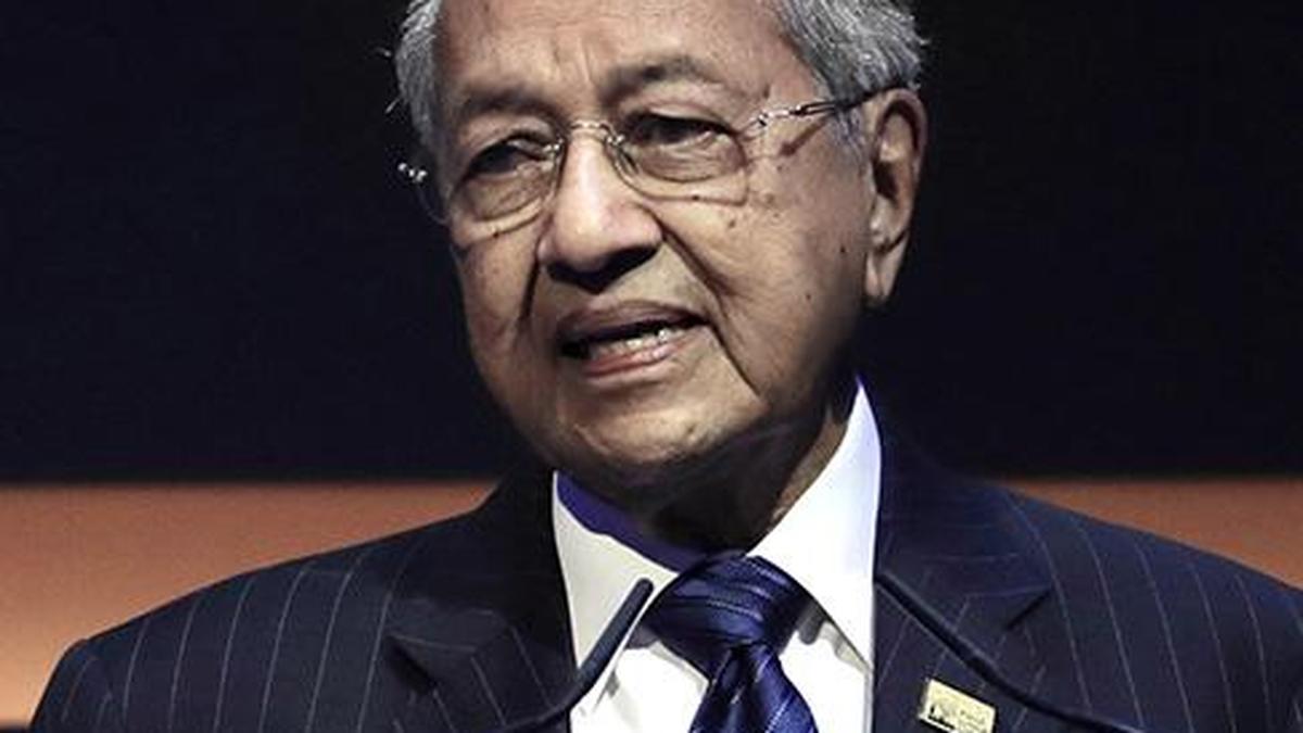 Malaysian turmoil takes new twist as Mahathir and Anwar ally again ...