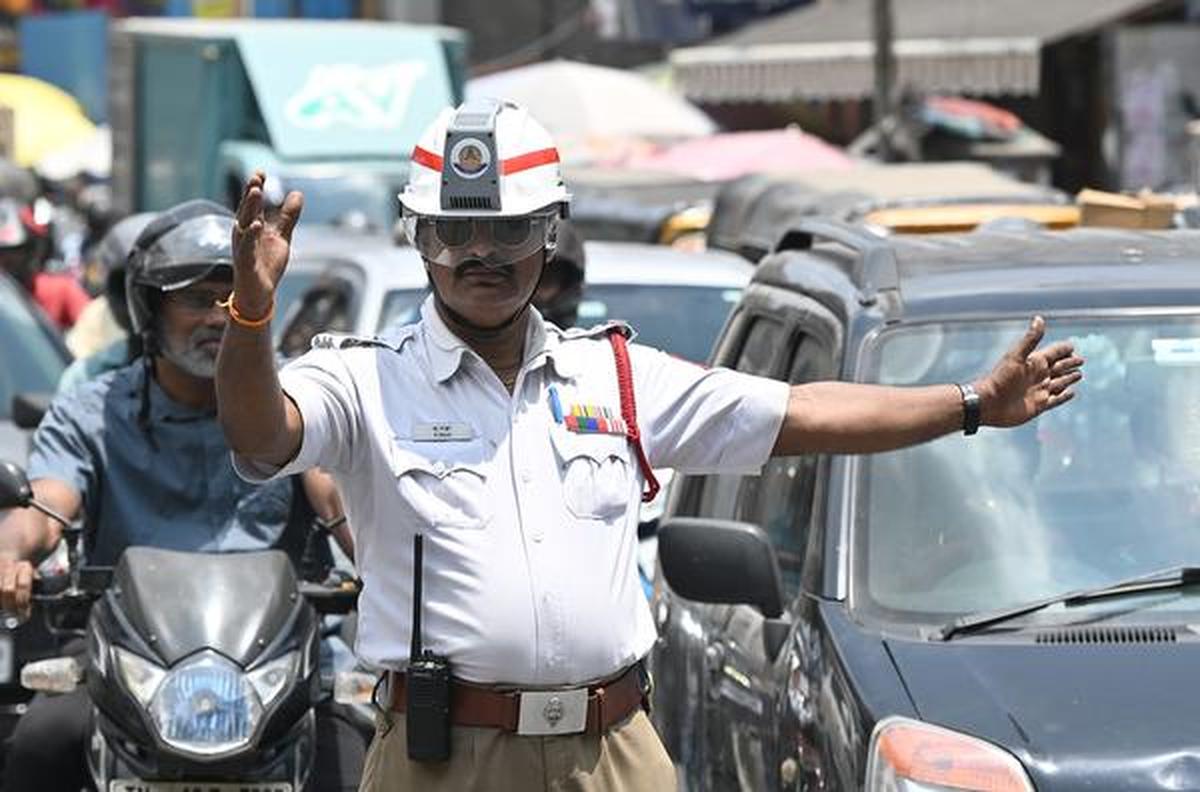 With ‘air-conditioned helmets’, Avadi traffic police hope to keep a cool head this summer - The ...